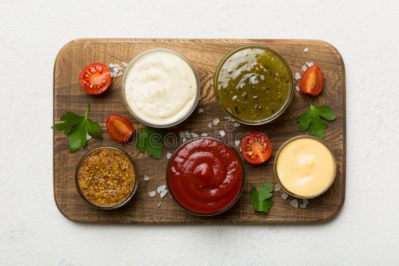 Many Different Sauces and Herbs on Table, Flat Lay Top View. Sauces on ...