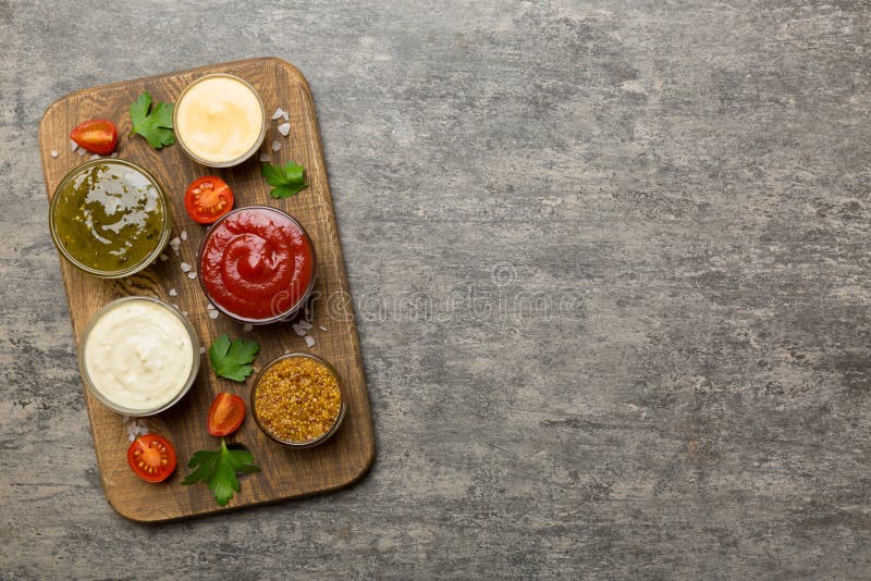 Many Different Sauces and Herbs on Table, Flat Lay Top View. Sauces on ...