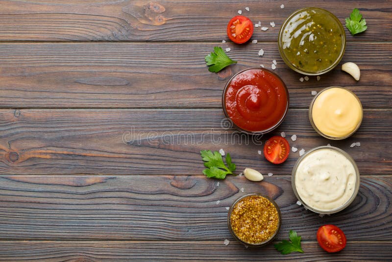 Many Different Sauces and Herbs on Table, Flat Lay Top View. Sauces ...