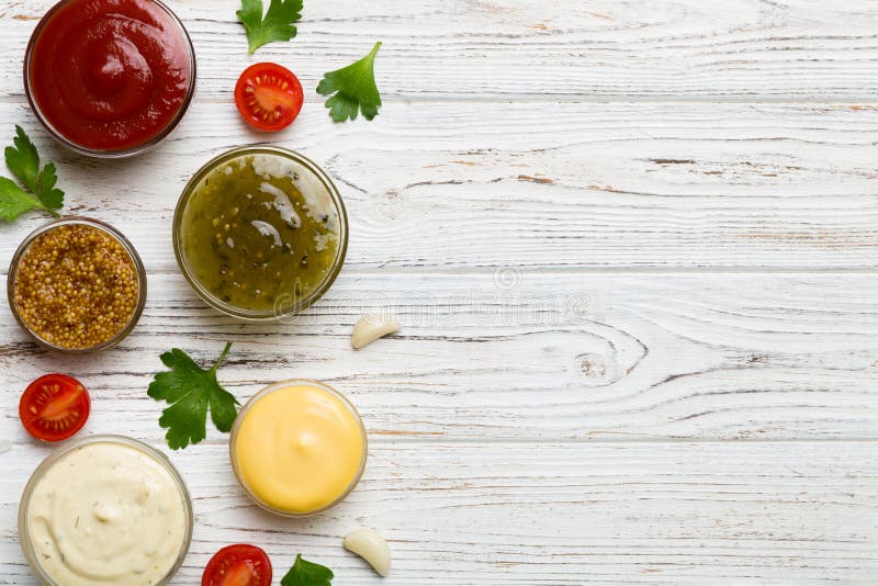 Many Different Sauces and Herbs on Table, Flat Lay Top View. Sauces ...
