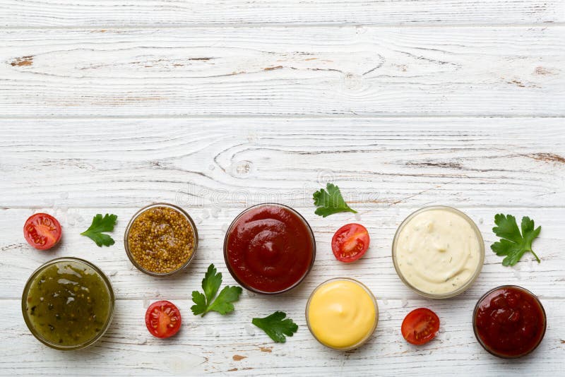 Many Different Sauces and Herbs on Table, Flat Lay Top View. Sauces ...