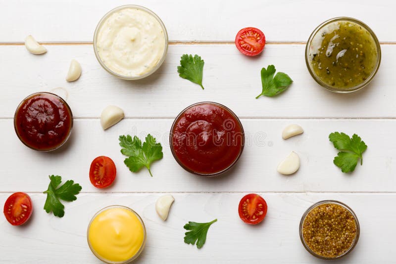 Many Different Sauces and Herbs on Table, Flat Lay Top View. Sauces ...