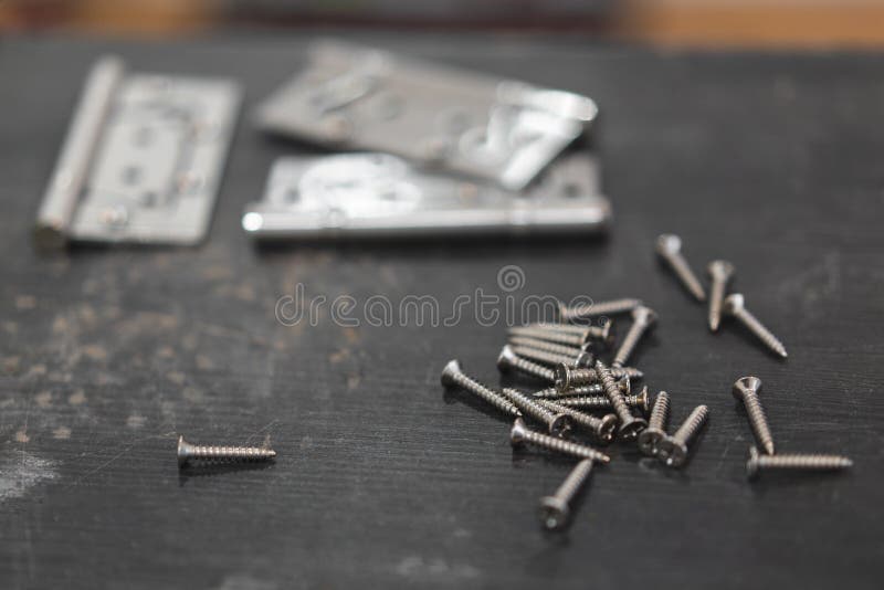 Many Different Screws Master on the Craftsman`s Table for Work Stock ...