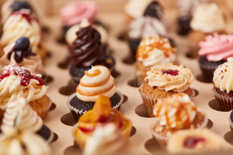 Many Different Cupcakes with Toppings and Decorations Stock Image ...