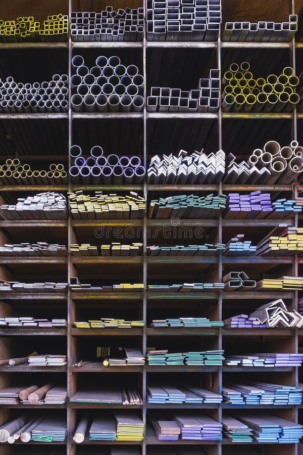 Many Different Steel Bars and Tubes on Storage Shelf of Building Supply ...