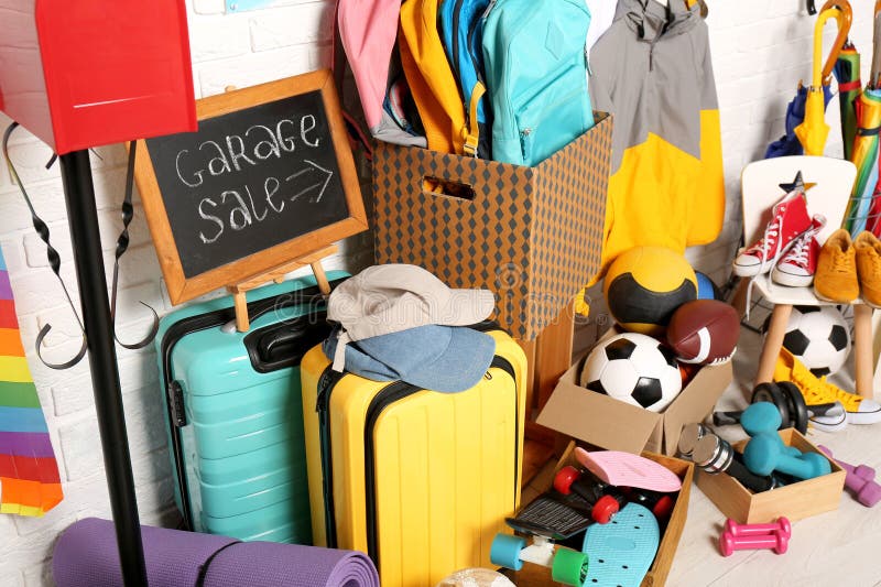 Many Different Stuff Near White Brick Wall. Garage Sale Stock Image ...