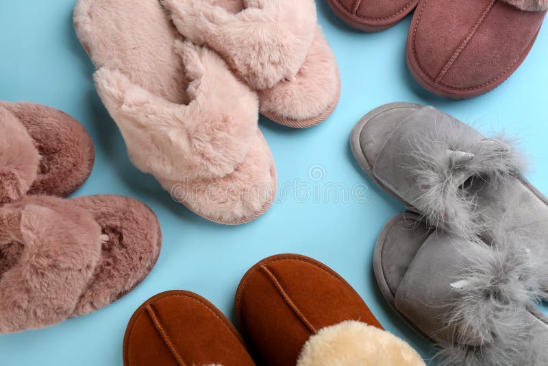 Many Different Stylish Soft Slippers on Light Blue Background, Flat Lay ...