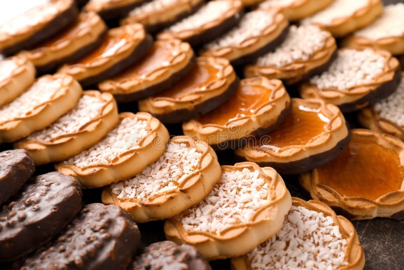 Many Different Sweet Cookies on Table Stock Photo - Image of closeup ...