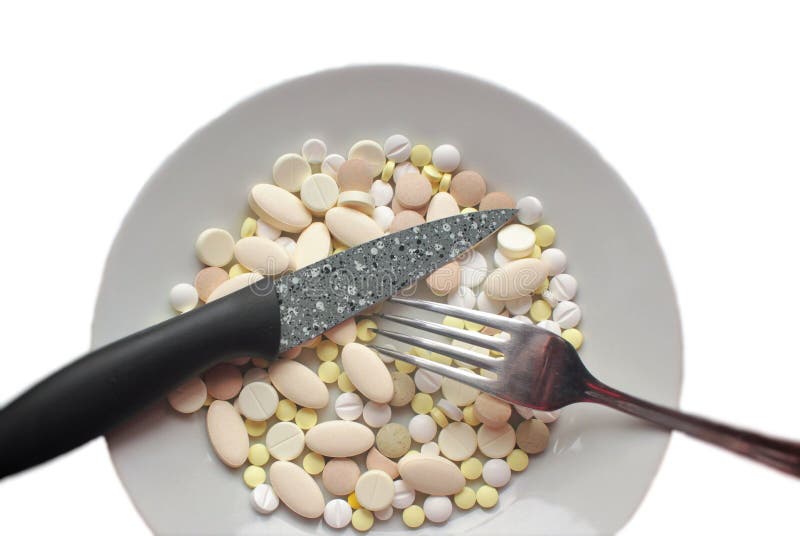 Many Different Tablets are on the Plate Isolated on White Stock Photo ...