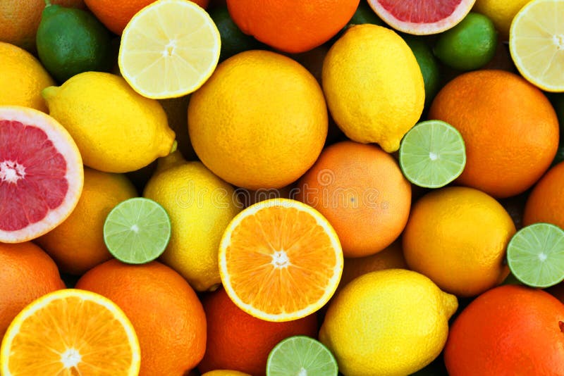 Many Different Whole and Cut Citrus Fruits As Background, Top View ...
