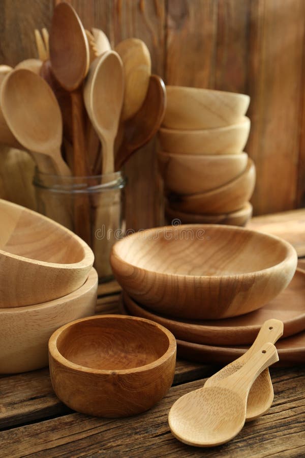 Many Different Wooden Dishware and Utensils on Table Stock Image ...