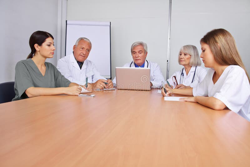 Many Doctors in a Team Meeting Stock Photo - Image of physician, nurse ...