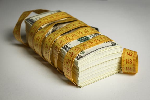 Many Dollar Bills Tied with Meter Stock Image - Image of tapemeasure ...