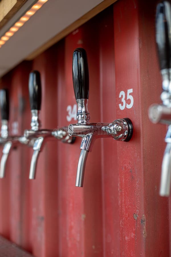 Many Draft Beer Handles in a Row Stock Image - Image of brewery, faucet ...