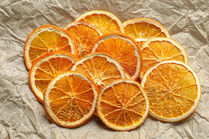 Many Dry Orange Slices on Crumpled Parchment, Flat Lay Stock Image ...