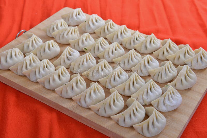 Many Dumplings on Chopping Board Stock Photo - Image of dinner, lunch ...