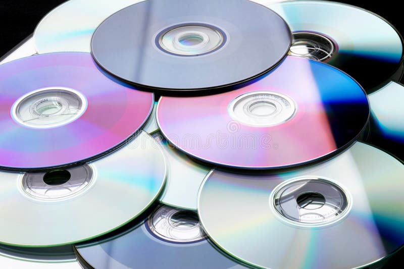 Pile of Many CDs or DVDs stock photo. Image of backgrounds - 2134864