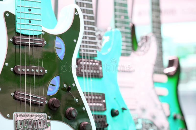 Many electric guitars stock photo. Image of guitar, hanging - 75917418