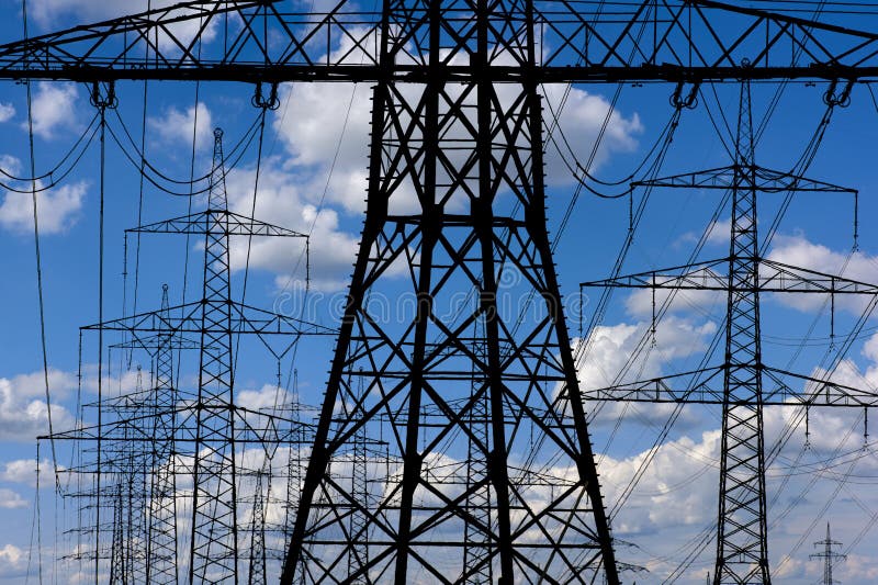 Many Electric Poles in Front of Sky with Clouds Stock Photo - Image of ...