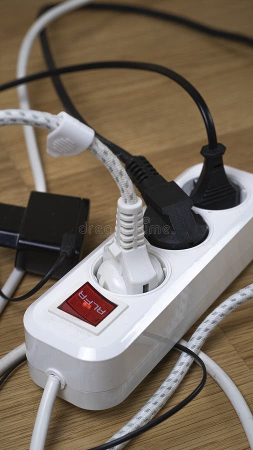 Many Electrical Devices Using Electricity through Electrical Plug Stock ...