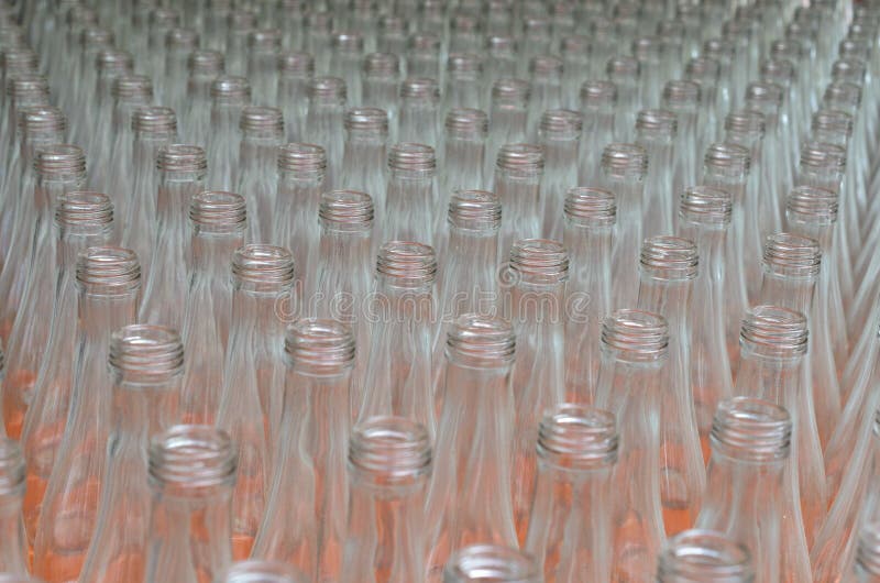Many Empty Translucent Bottles in a Row are Perspective. Stock Image ...