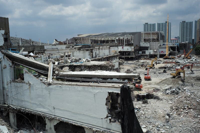 Many Excavators Working on the Ground of the Construction Site while ...