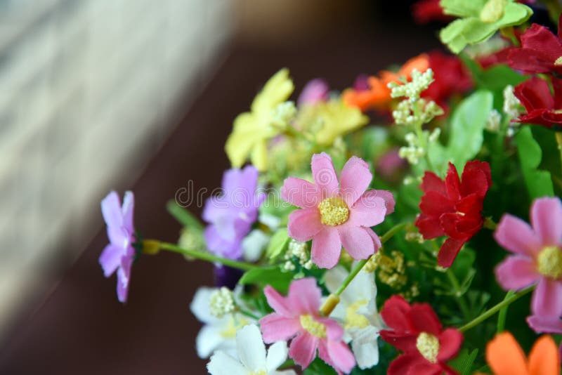 Many Fake Flowers are in the Same Bouquet. Color Full of Fabric Flowers ...