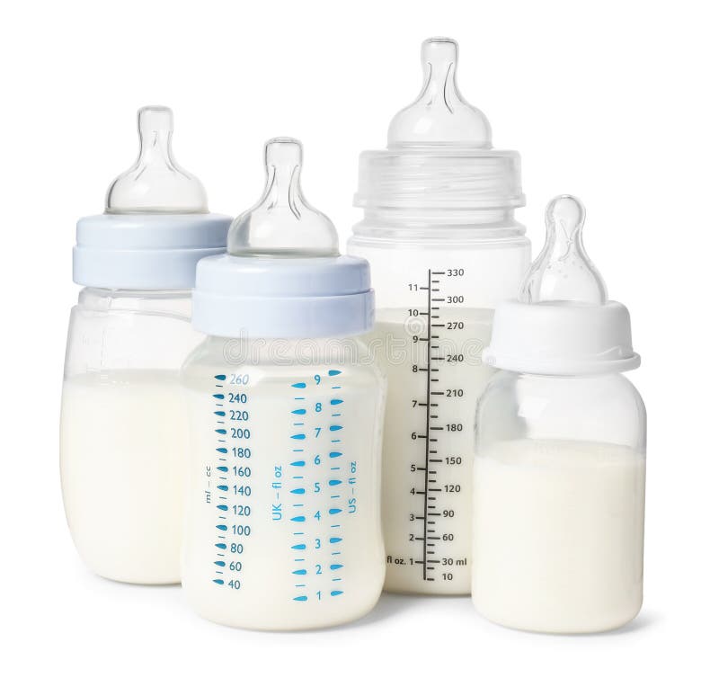 Many Feeding Bottles with Infant Formula on White Background Stock ...