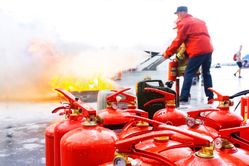 Many Fire Extinguishers in a Fire Safety Lesson. the Process of ...