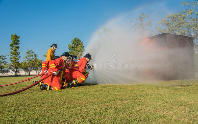 Many Fireman from Rescue Team are Going To Fight the Fire Stock Image ...