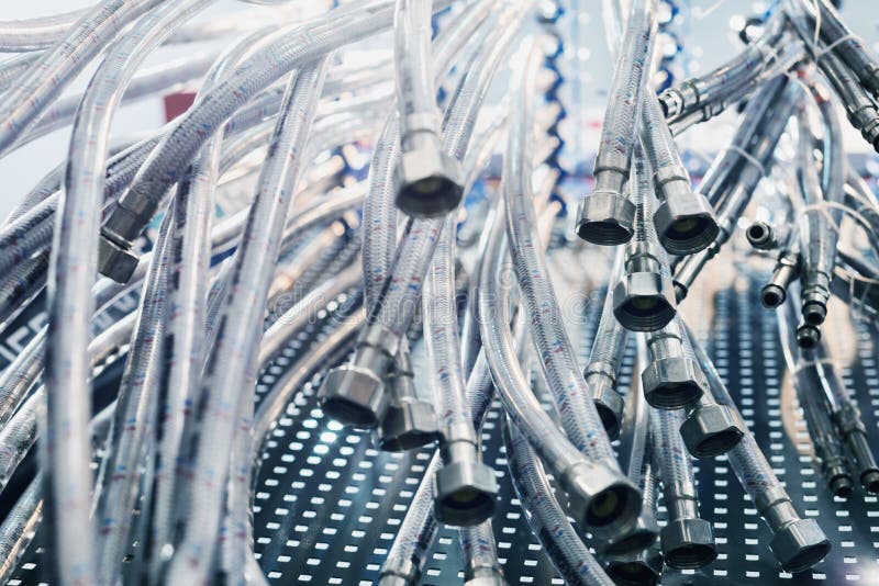 Many Flexible Water Hoses. Selective Focus, Shallow Depth of Field ... Many Flexible Water Hoses. Selective Focus, Shallow Depth of Field ...