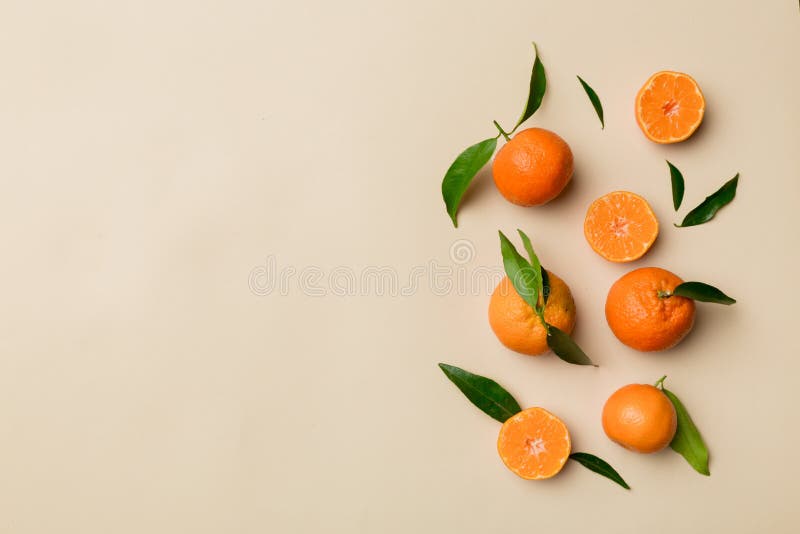 Many Fresh Ripe Mandarin with Green Leaves on Colored Background, Top ...
