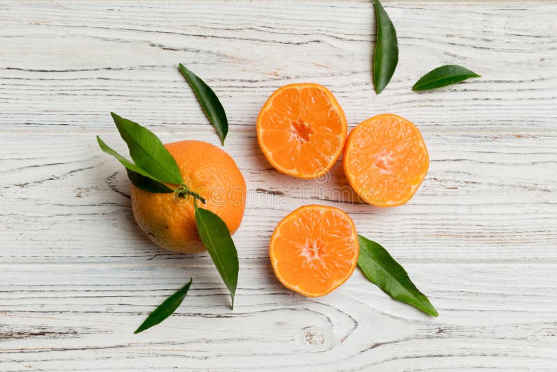 Many Fresh Ripe Mandarin with Green Leaves on Colored Background, Top ...