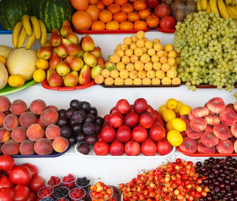 Many Fresh, Ripe and Useful Fruits Lie on the Counter Stock Photo ...