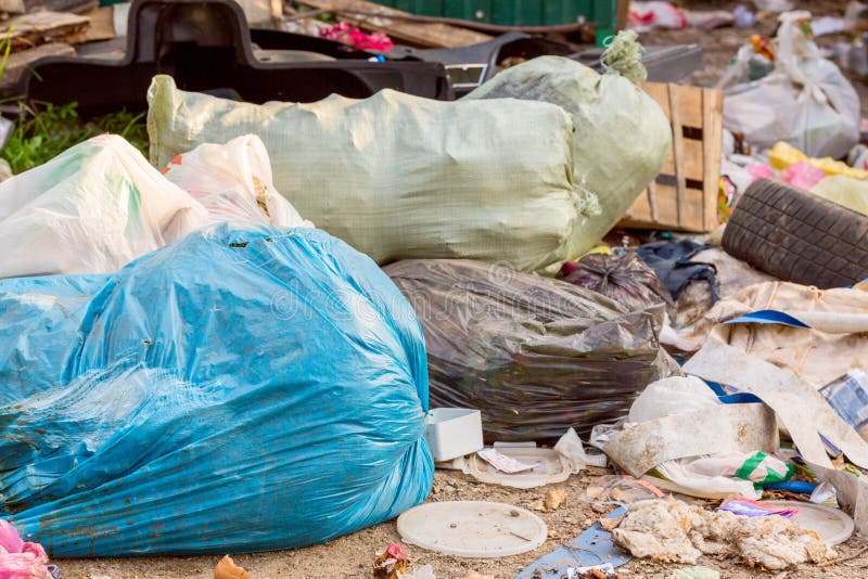 Many Garbage and Waste Bags Outdoors. Ecology and Nature Damage Concept ...