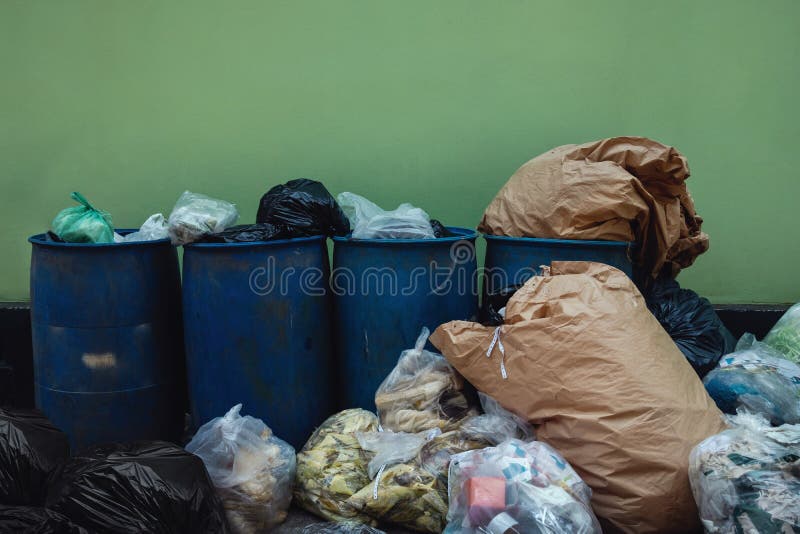 Many Garbages and Full Trash Againt the Wall. Pollution Problem from ...