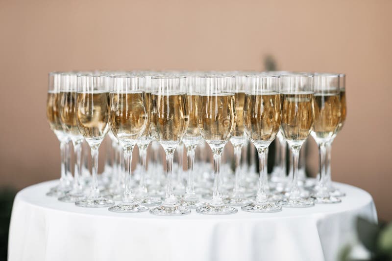 Champagne Table at Reception Stock Photo - Image of centerpieces ...