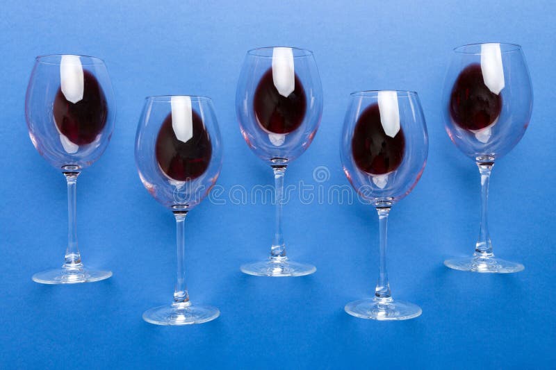 Many Glasses of Red Wine at Wine Tasting. Concept of Red Wine on ...