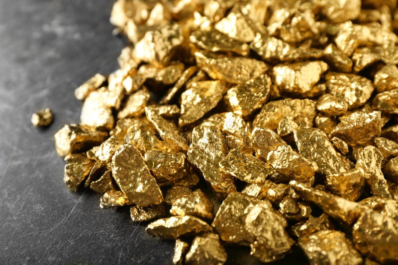Many gold nuggets on table stock image. Image of market - 151266871