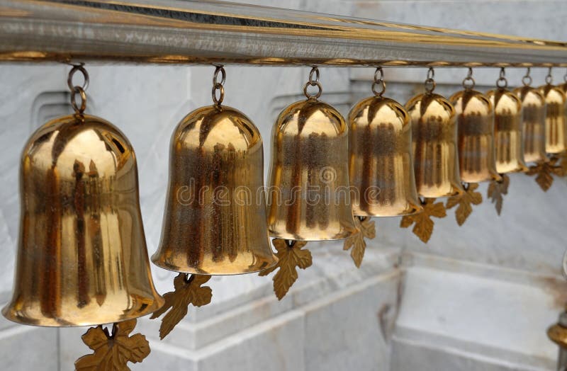 Many Golden Bells with Ringing of the Bells in the Temple of Thailand ...