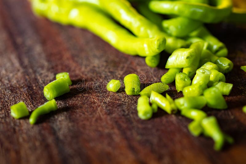 Many Green Pepperonis Partly Cut into Pieces Stock Photo - Image of ...
