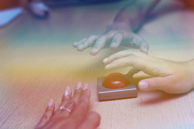 Many Hand Grab for the Red Button on Wood Table. Stock Image - Image of ...