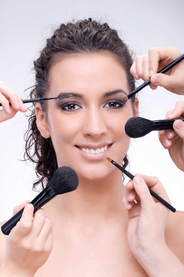 Many Hands Applying Make Up Stock Photo - Image of lips, isolated: 16717342