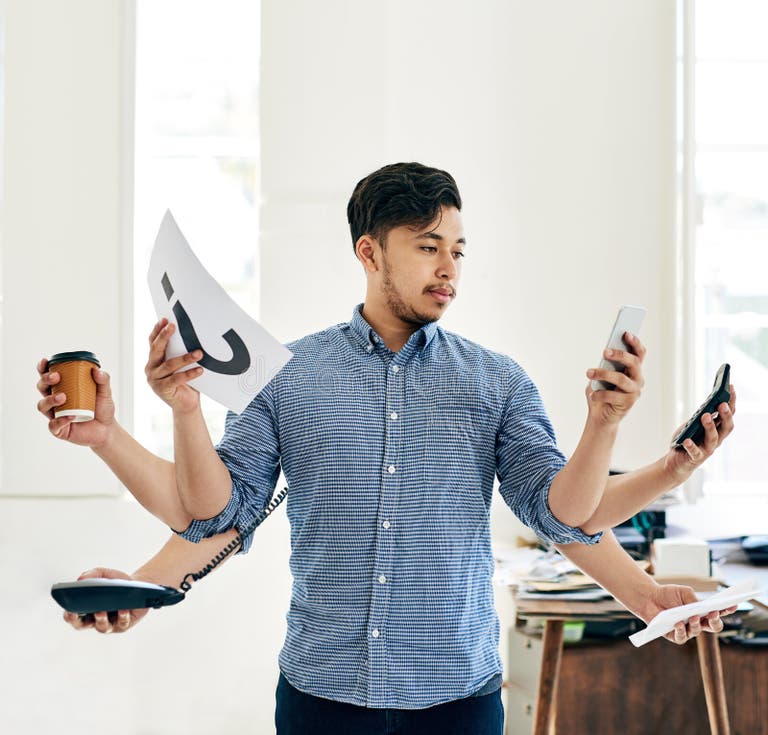 Many Hands Make Business Work. a Young Entrepreneur Multitasking at ...