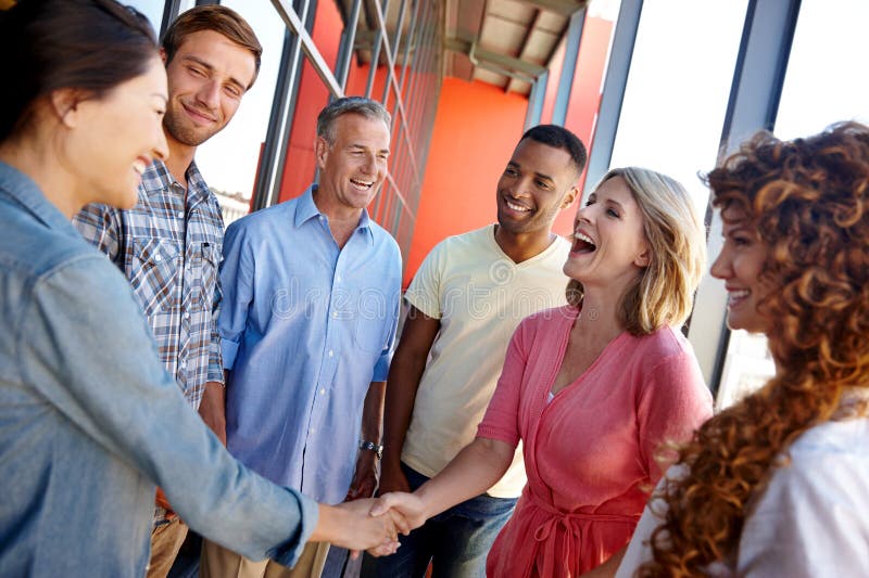 Many Hands Make Light Work. a Diverse Group of Coworkers Having a ...