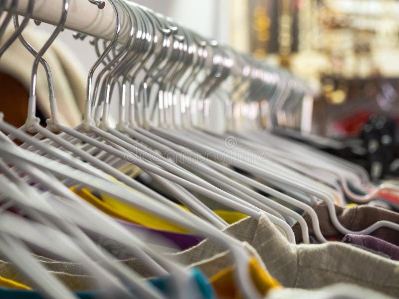 Many Hangers with Different Clothes in the Store Stock Photo - Image of ...