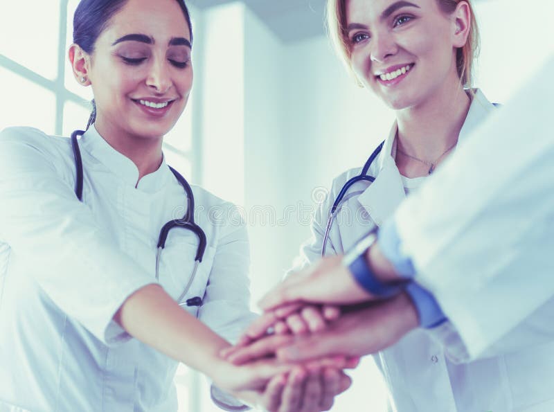 Many Happy Doctors Stack Hands Together As Team for Motivation Stock ...