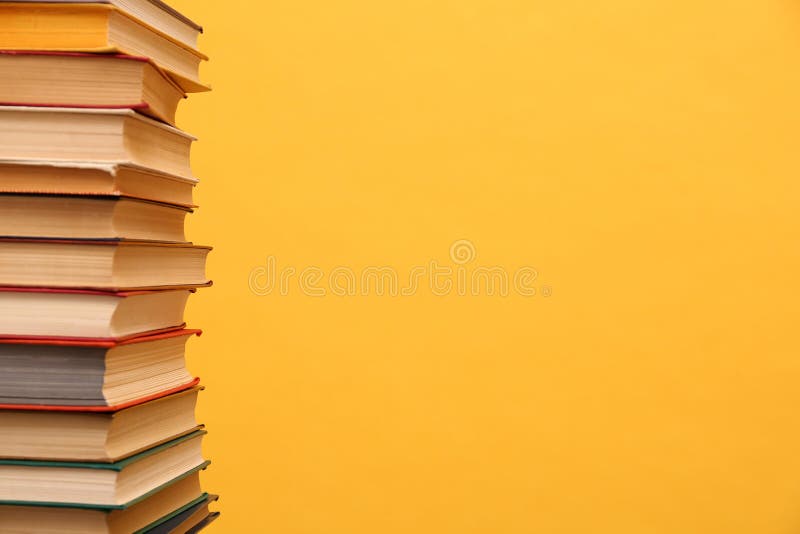 Many Hardcover Books on Orange Background, Space for Text. Library ...