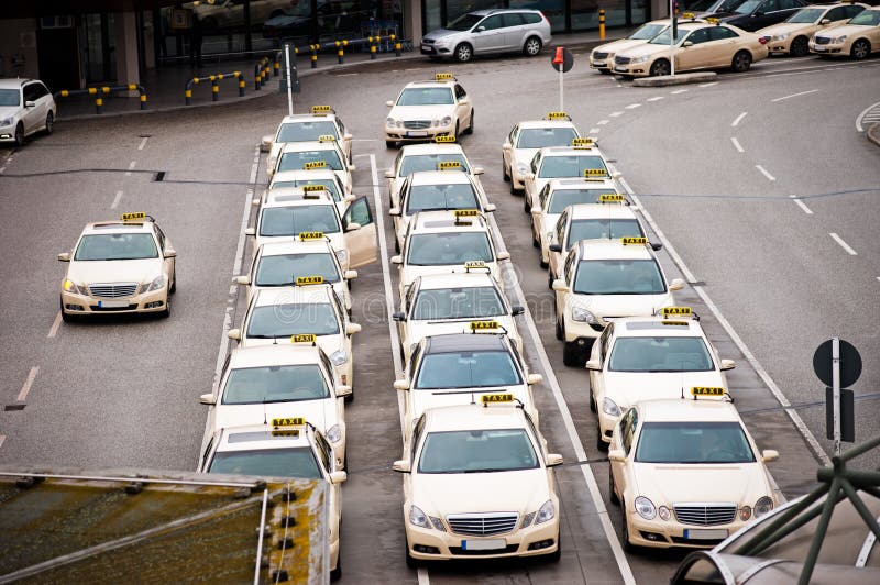 Many identical taxi stock image. Image of order, column - 24108755