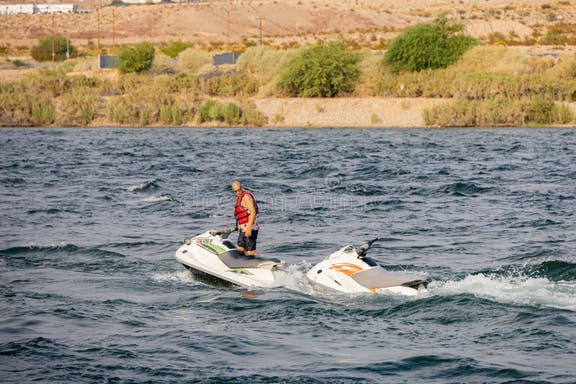 Many jet ski by the river editorial stock image. Image of laughlin ...
